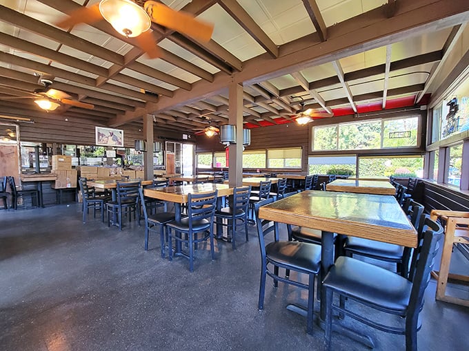 Simple wooden tables and ceiling fans create the perfect no-nonsense setting. Here, the decor takes a backseat to what really matters: the food.