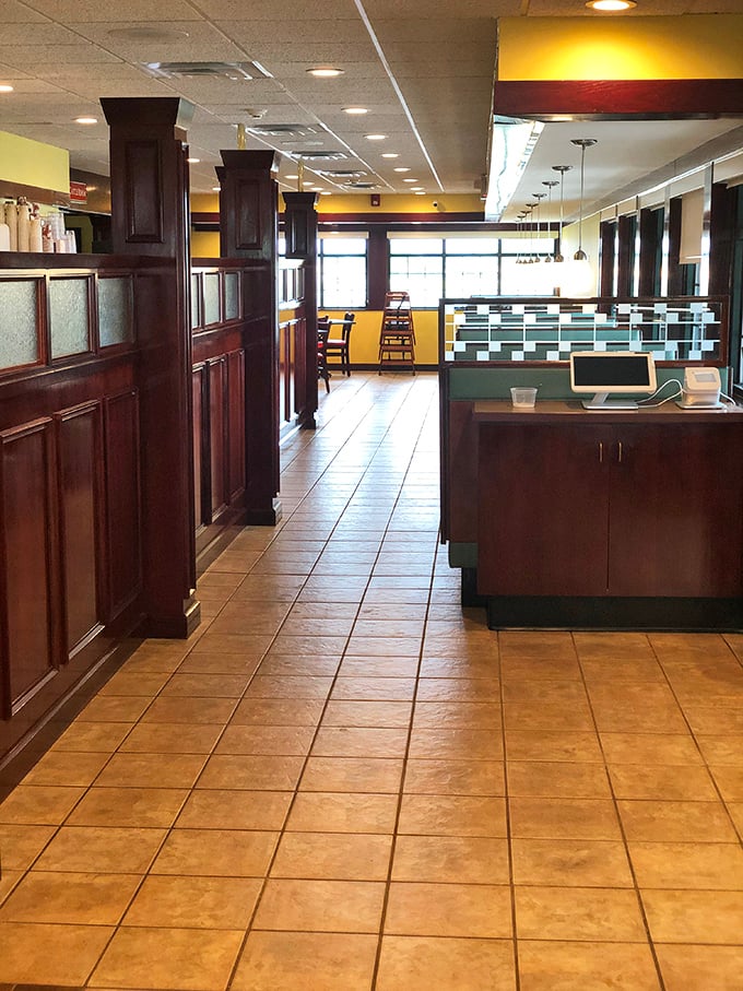 Rich wooden accents and warm tones create an atmosphere that says "stay awhile" – the dining room equivalent of a comfortable pair of slippers.