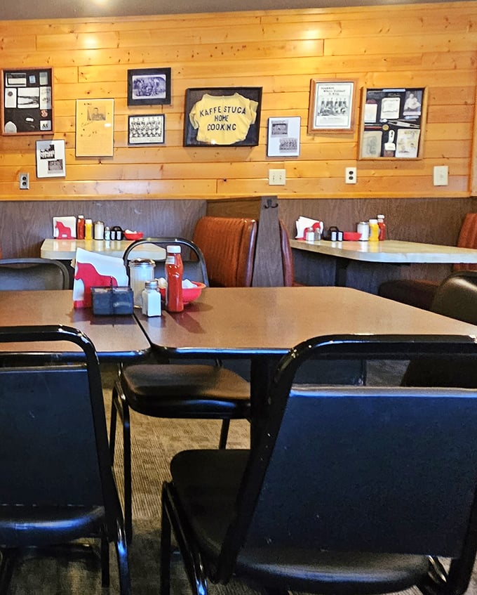 Classic diner charm with pine-paneled walls showcasing decades of local history—this is Minnesota's version of a time machine with pancakes.