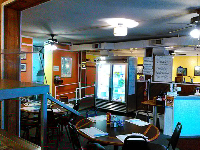 Step inside and the warm orange and yellow walls embrace you like a culinary hug. This isn't Instagram-bait décor—it's genuine small-town comfort.