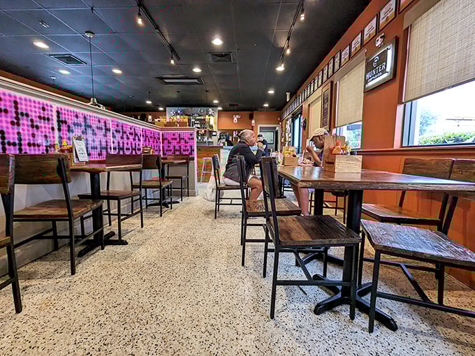 Warm wood, polished concrete, and that unmistakable neighborhood vibe—this is where burger dreams are born.