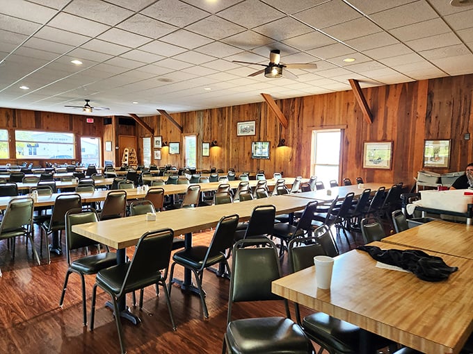 Family-style dining at its finest—where strangers become friends over shared platters and the wood-paneled walls hold decades of laughter.