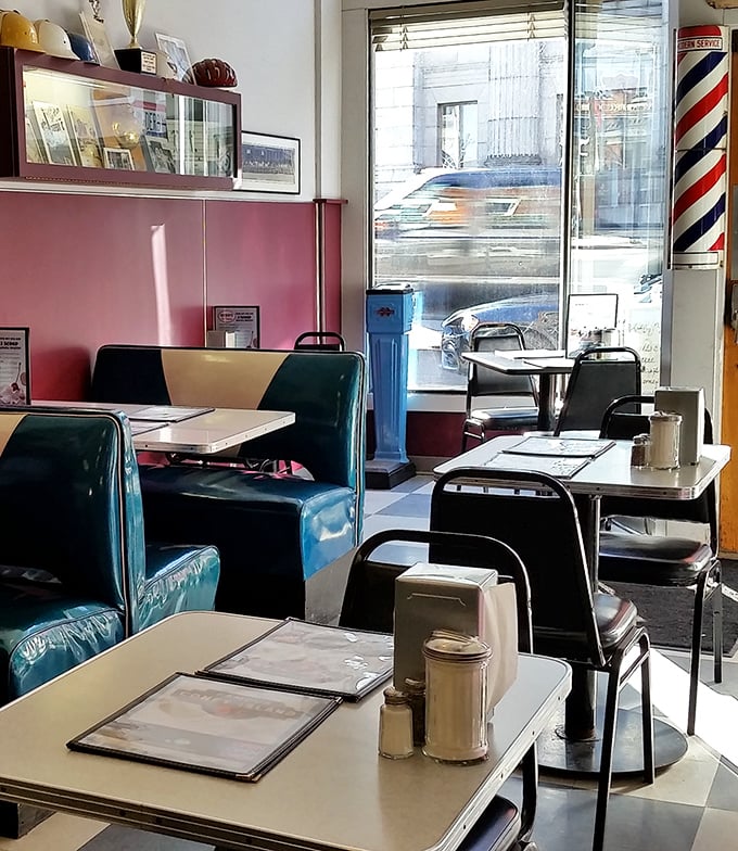 Step back in time with these vintage booths—where the vinyl is teal, the tables are Formica, and the memories are priceless.