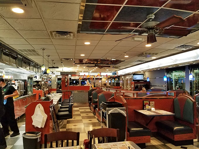 Step inside and you're transported to the golden age of diners—red vinyl booths, checkered floors, and the promise of comfort food that makes Monday mornings bearable.