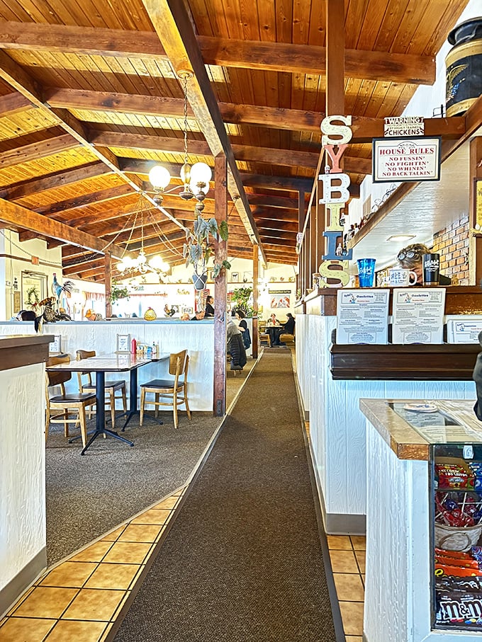 Wooden beams and that iconic "SYBIL'S" sign hanging from the ceiling—breakfast ambiance doesn't get more perfect than this.