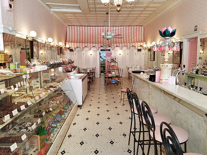 Step back in time where marble counters and hexagonal tiles tell stories of generations past. The pink-striped awnings inside aren't decorating—they're preserving history.