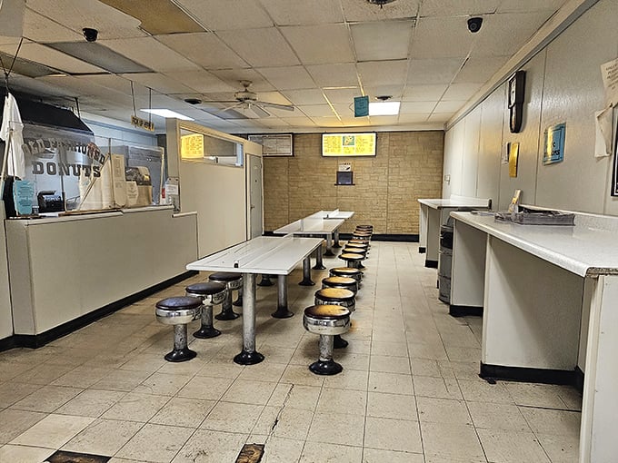 Simplicity reigns supreme inside with no-nonsense swivel stools and formica tables—this place knows the donuts should be the star of the show. 