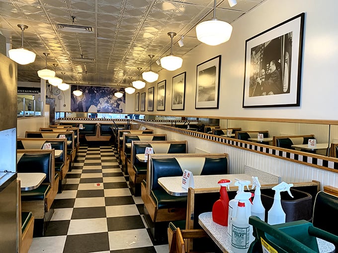 The classic black and white checkered floor isn't trying to be retro-cool—it earned its vintage status the old-fashioned way: by actually being vintage.