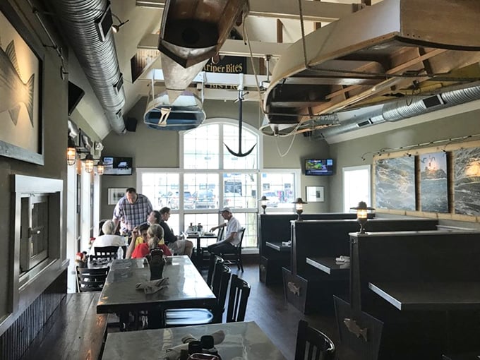 Boats suspended from the ceiling aren't just decor—they're a promise that what's on your plate was swimming not long ago. Maritime magic meets dining delight.