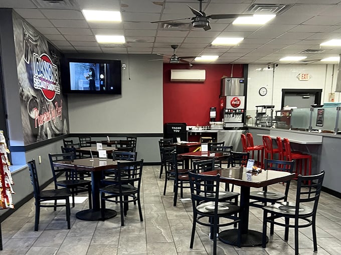Simple, clean, and focused on what matters – the food. Those red chairs aren't just for show; they're front-row seats to a sandwich symphony.