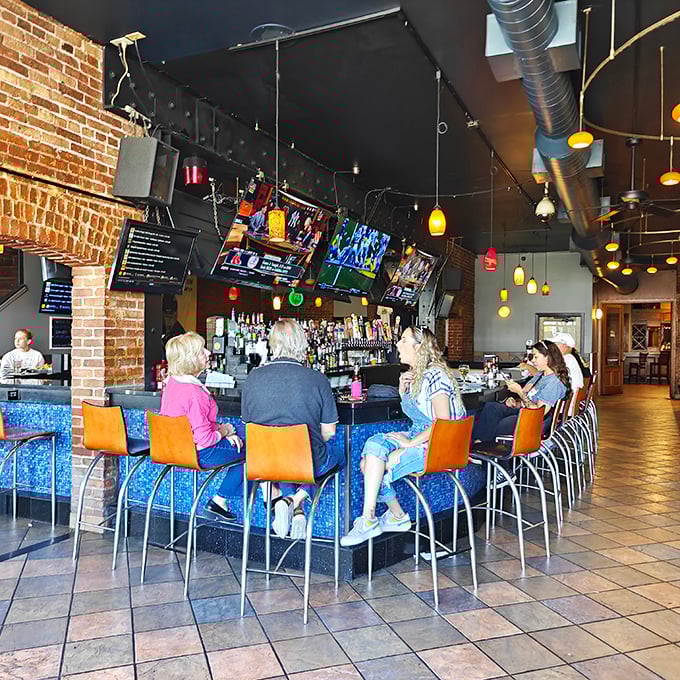 The blue-accented bar area strikes that perfect balance—upscale enough for date night, casual enough for Tuesday's dinner craving.