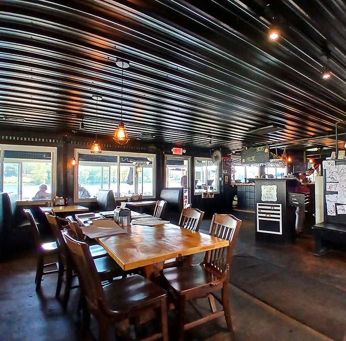 Industrial chic meets comfort food paradise where corrugated ceilings frame memories waiting to be made over serious barbecue.