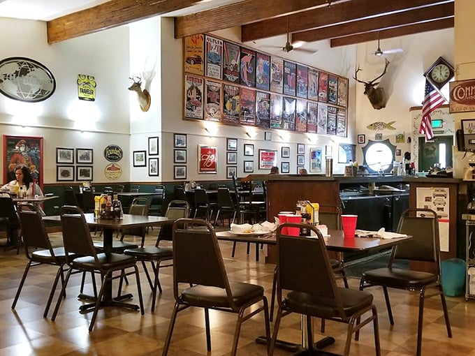 Step inside and the walls tell stories: vintage posters, mounted trophies, and wooden beams create that perfect "been here forever" vibe that no corporate chain can replicate.