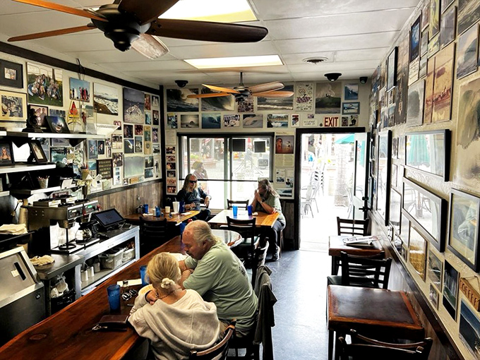 Every inch of wall space tells a story—surfing legends, local memories, and decades of California coastal life create a scrapbook you can dine in.