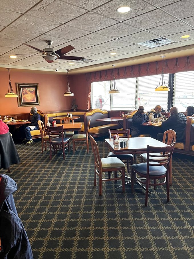 Warm amber lighting, comfortable booths, and that unmistakable diner buzz – Lumes' interior feels like breakfast's natural habitat.