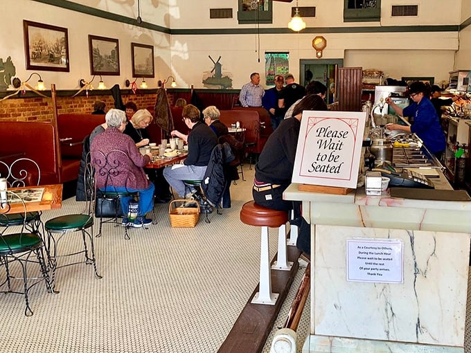 Time travel isn't just science fiction—it's what happens when you step into this vintage diner where conversations hum between marble counters and classic booths.