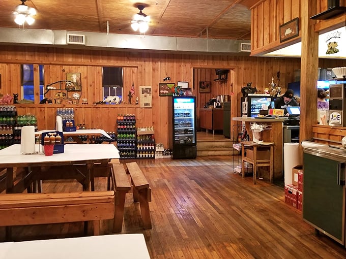 Wooden walls, picnic tables, and that unmistakable aroma of hickory smoke—this isn't just a restaurant, it's a barbecue sanctuary where calories don't count.