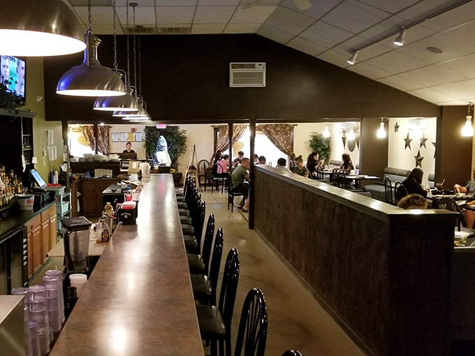 Inside, warm lighting and comfortable seating create the perfect backdrop for the flavor explosion that's about to happen on your plate.