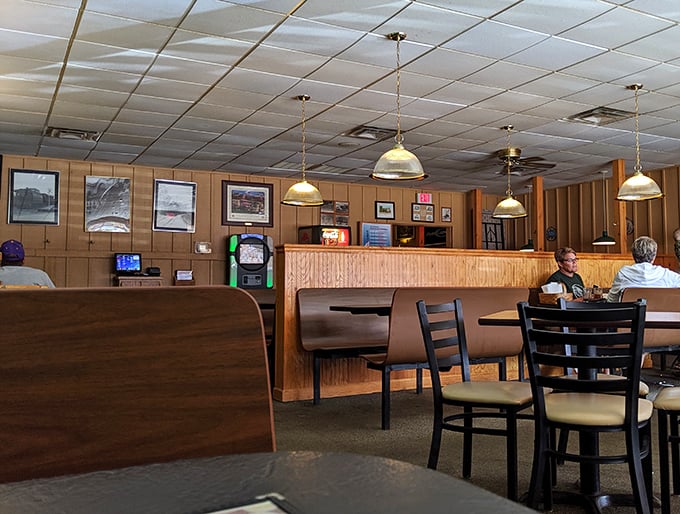 Wood paneling and pendant lights transport you to simpler times when conversations happened face-to-face, not screen-to-screen.