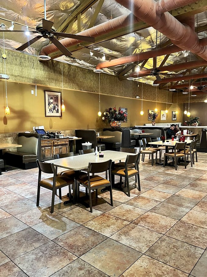 Exposed beams, warm lighting, and golden walls create the perfect backdrop for memory-making meals. Like a Mexican living room, but with better service.
