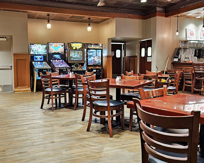 Arcade games tucked beside wooden tables – because nothing builds an appetite like a round of Pac-Man before pancakes.