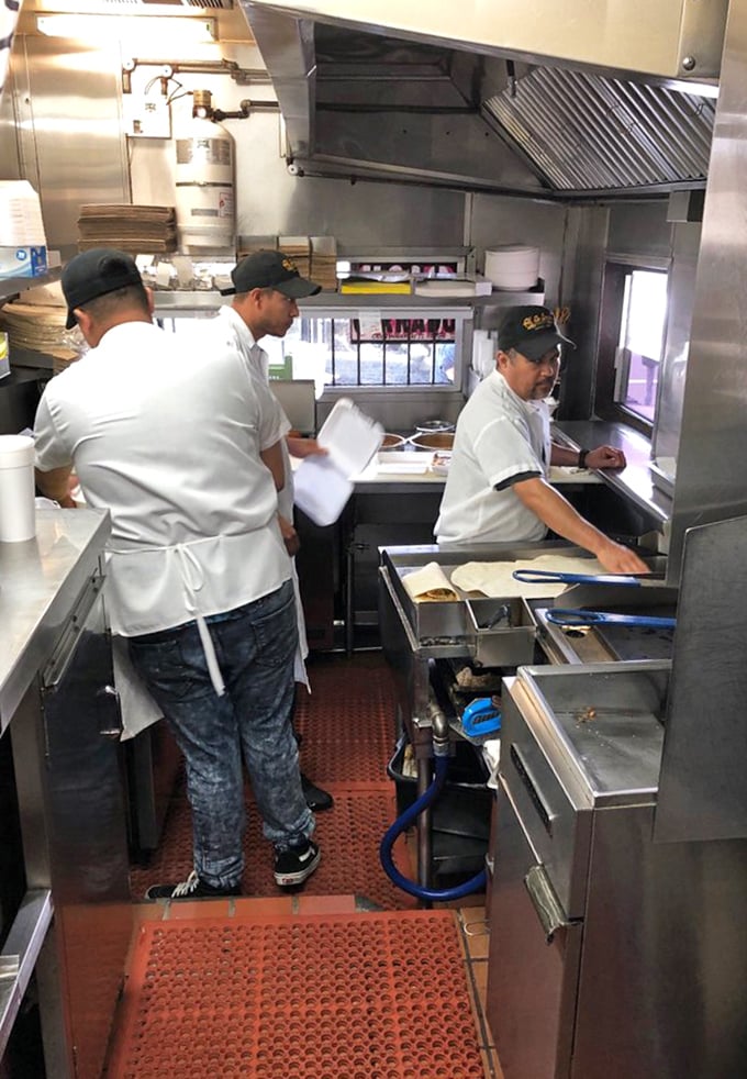 Behind the scenes, the kitchen crew works with the precision of NASA engineers, except their mission is sending perfectly crafted burritos into orbit around your taste buds.