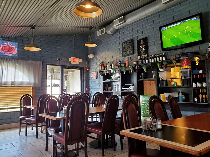 Inside, painted brick walls and high-backed chairs create that perfect "neighborhood Italian joint" vibe where comfort trumps pretension.