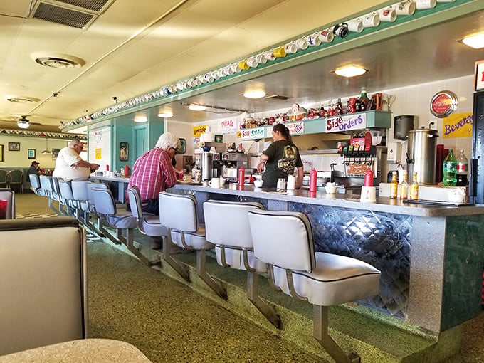 The counter at Mel's isn't just a place to eat—it's front-row seating to the greatest show in Phoenix: breakfast made with purpose.