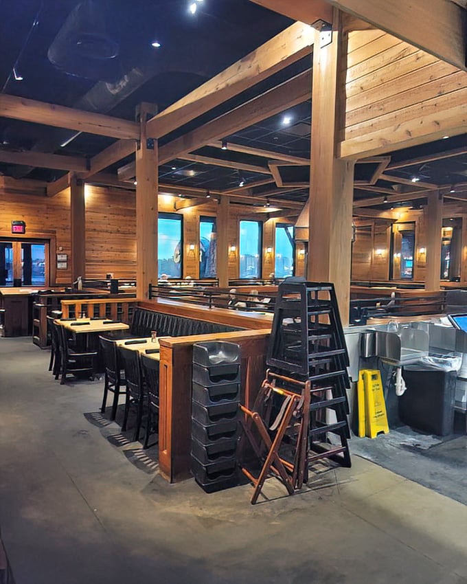 Exposed wooden beams and cozy booth seating create that perfect "welcome home" feeling—if your home happened to be a luxurious Alaskan fishing lodge.