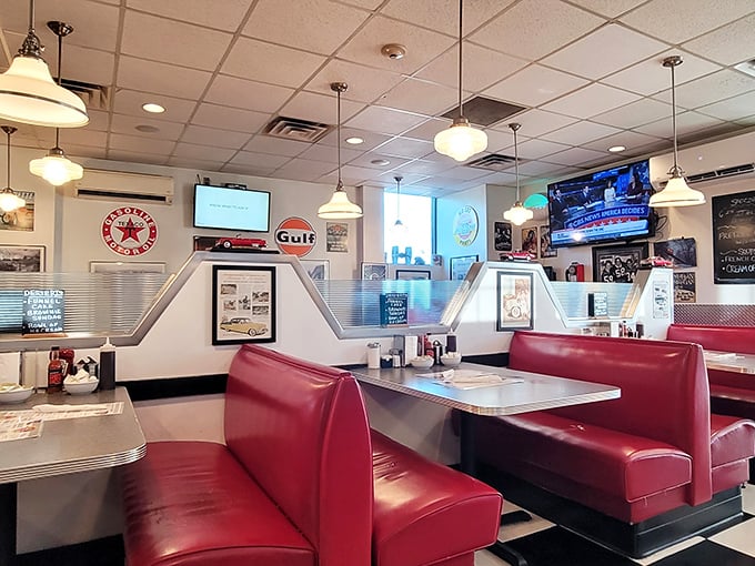 Classic Americana comes alive in these gleaming red vinyl booths. The vintage Gulf and Texaco signs aren't just decoration—they're time machines.