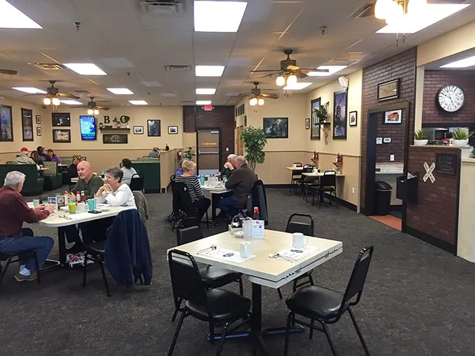 Inside, the warm, inviting dining room buzzes with conversation as ceiling fans lazily spin overhead. This isn't Instagram-bait décor—it's the authentic comfort of a true local gathering spot.