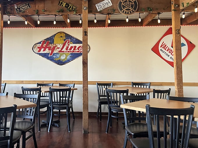 Vintage signs and simple furnishings create that perfect "third place" atmosphere—somewhere between home and work where everybody feels welcome.
