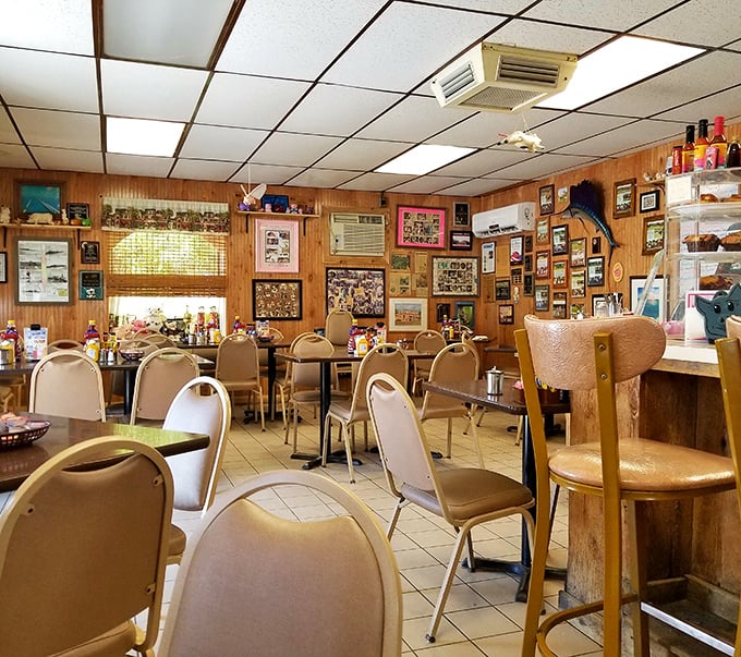 Step inside and you're greeted by wood-paneled walls adorned with local memorabilia – the Florida Keys equivalent of your favorite aunt's cozy kitchen.