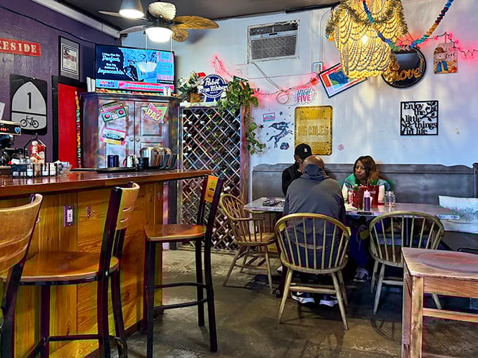 Inside, mismatched chairs and eclectic decor create that rare "everybody knows your name" vibe that chain restaurants spend millions trying to fake.