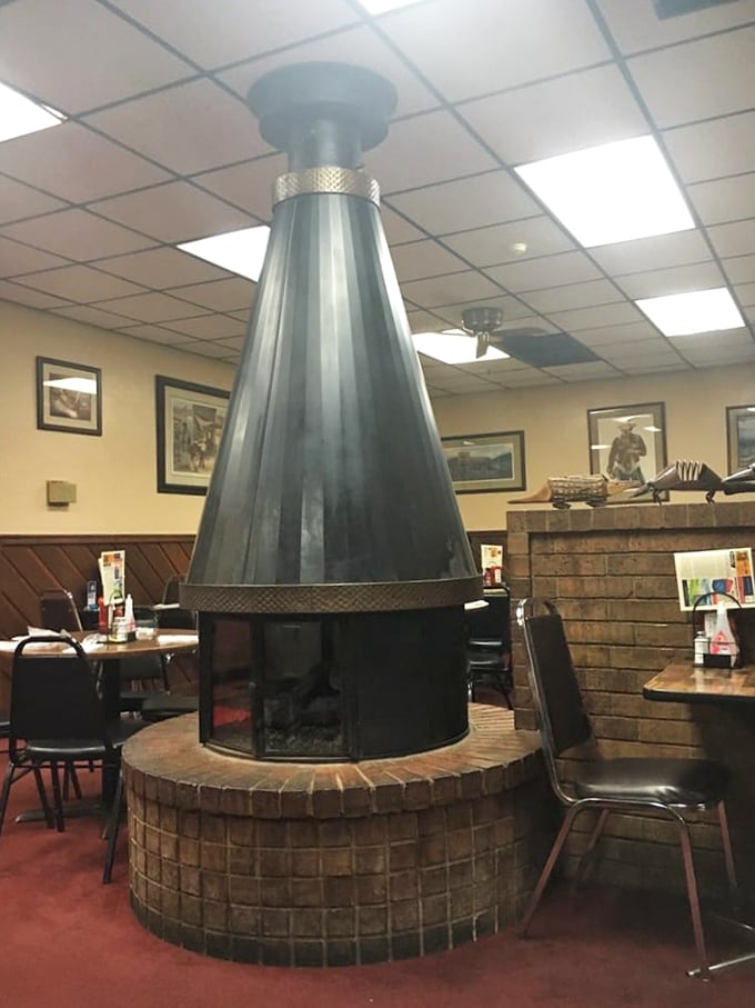 The centerpiece fireplace isn't just for show—it's a testament to Jake's commitment to the primal art of cooking meat over fire.