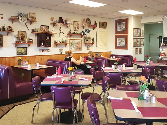 Purple vinyl booths and walls adorned with vintage treasures—Lou's interior feels like your favorite aunt's kitchen, if she could cook for fifty.