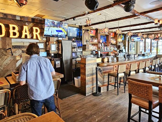 The rustic-chic bar area combines weathered wood and star-shaped lanterns, creating the perfect backdrop for tequila-fueled stories you'll embellish for years.