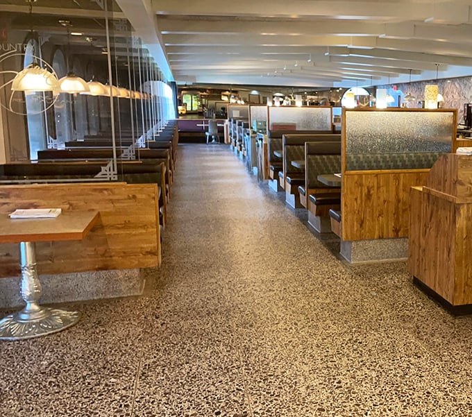 Classic diner comfort awaits inside with wooden booths, terrazzo flooring, and pendant lighting that's witnessed countless coffee refills and breakfast debates.