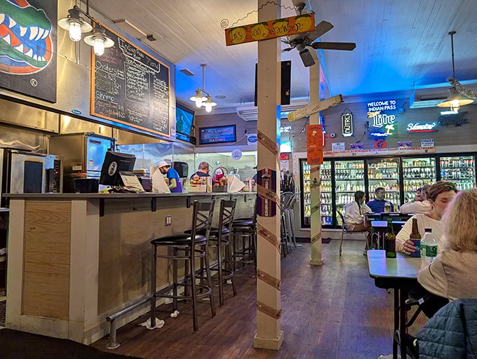 Step inside and you've entered seafood paradise – where neon beer signs, wooden beams, and the promise of fresh oysters create the perfect unpretentious dining atmosphere.