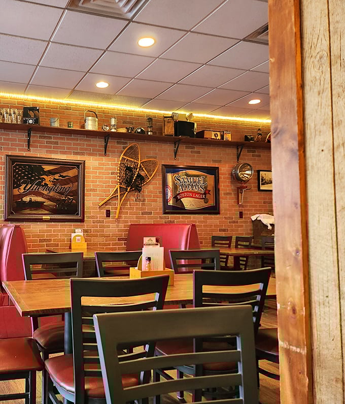 Exposed brick walls adorned with vintage memorabilia create that perfect "I've discovered something special" atmosphere that makes local gems truly shine.