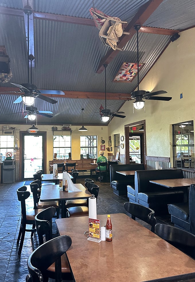 Corrugated metal ceilings, wooden beams, and simple lighting create that "grandma's kitchen meets Texas roadhouse" vibe we all secretly crave.