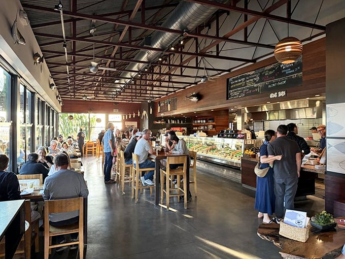 Inside, the warm wood tones and industrial ceiling create that perfect "serious about seafood, not about pretension" vibe that makes regulars out of first-timers.