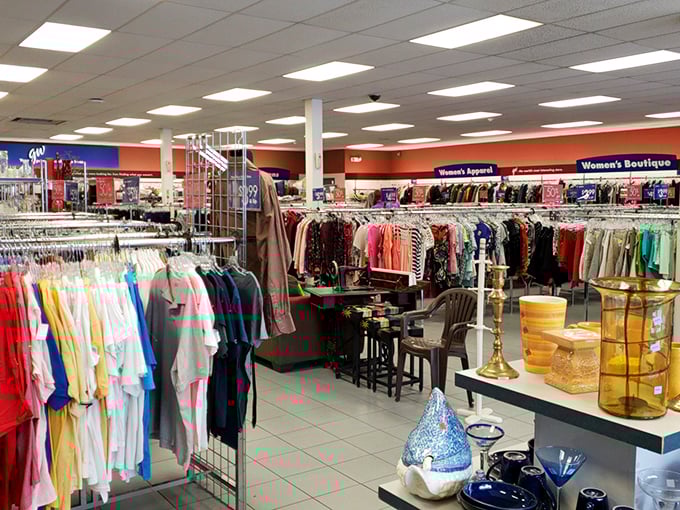 The women's clothing section bursts with colorful options, from casual tees to elegant blouses, all arranged with surprising orderliness.