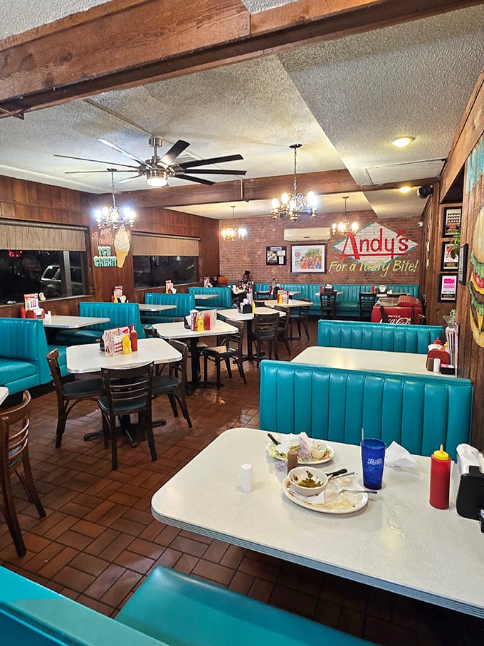 Step inside and the turquoise booths whisper stories of decades past, while wooden paneling creates the warm embrace only classic diners can offer.