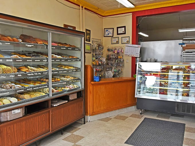 A classic small-town bakery storefront that whispers, "Slow down, friend—life's sweetest pleasures aren't found in a hurry."