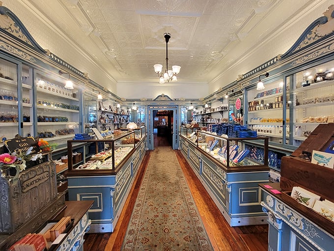 Walking into Shane's is like stepping into a confectionery cathedral—polished wood, gleaming glass, and that carpet runner practically begging you to slow down and savor the moment. 