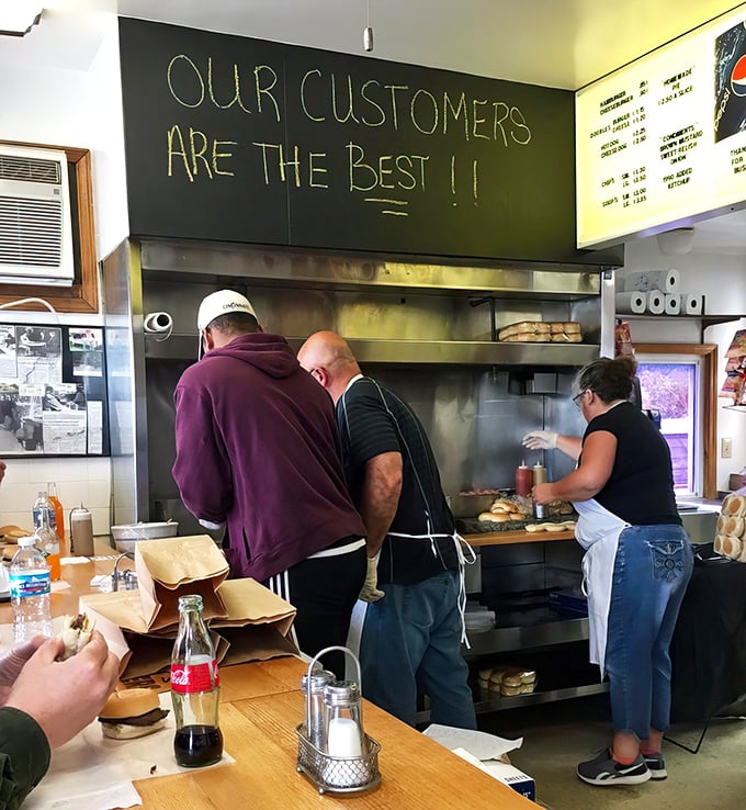"Our customers are the best!!" isn't just a slogan—it's the philosophy that keeps this grill sizzling with hometown pride and perfectly pressed patties.