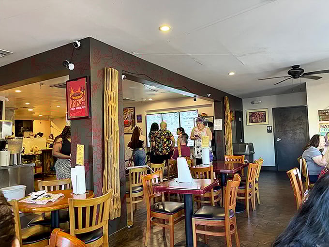 Inside, wooden tables and simple décor let the food take center stage—this is a place of gathering, not Instagram-baiting design trends.