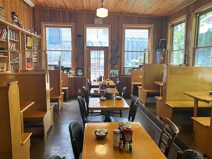 Wooden booths, paneled walls, and bookshelves create the feeling you've stumbled into the world's coziest library that happens to serve incredible eggs.