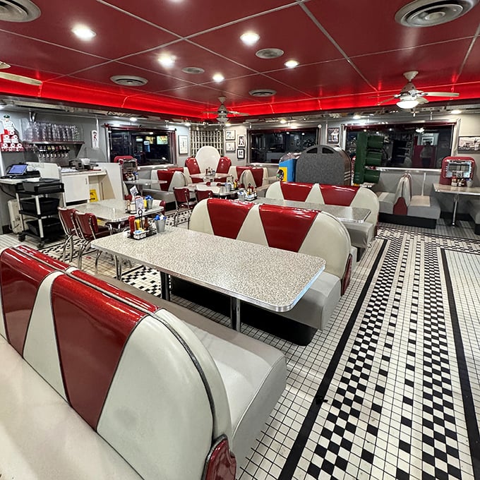 Red vinyl booths and checkerboard floors create the perfect backdrop for life's important decisions—like whether to order the pancakes or the waffles. (Correct answer: both.)